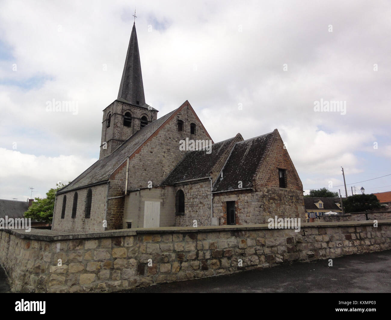 This image shows the chevet of a church in Bermerain, Nord, France. The ...