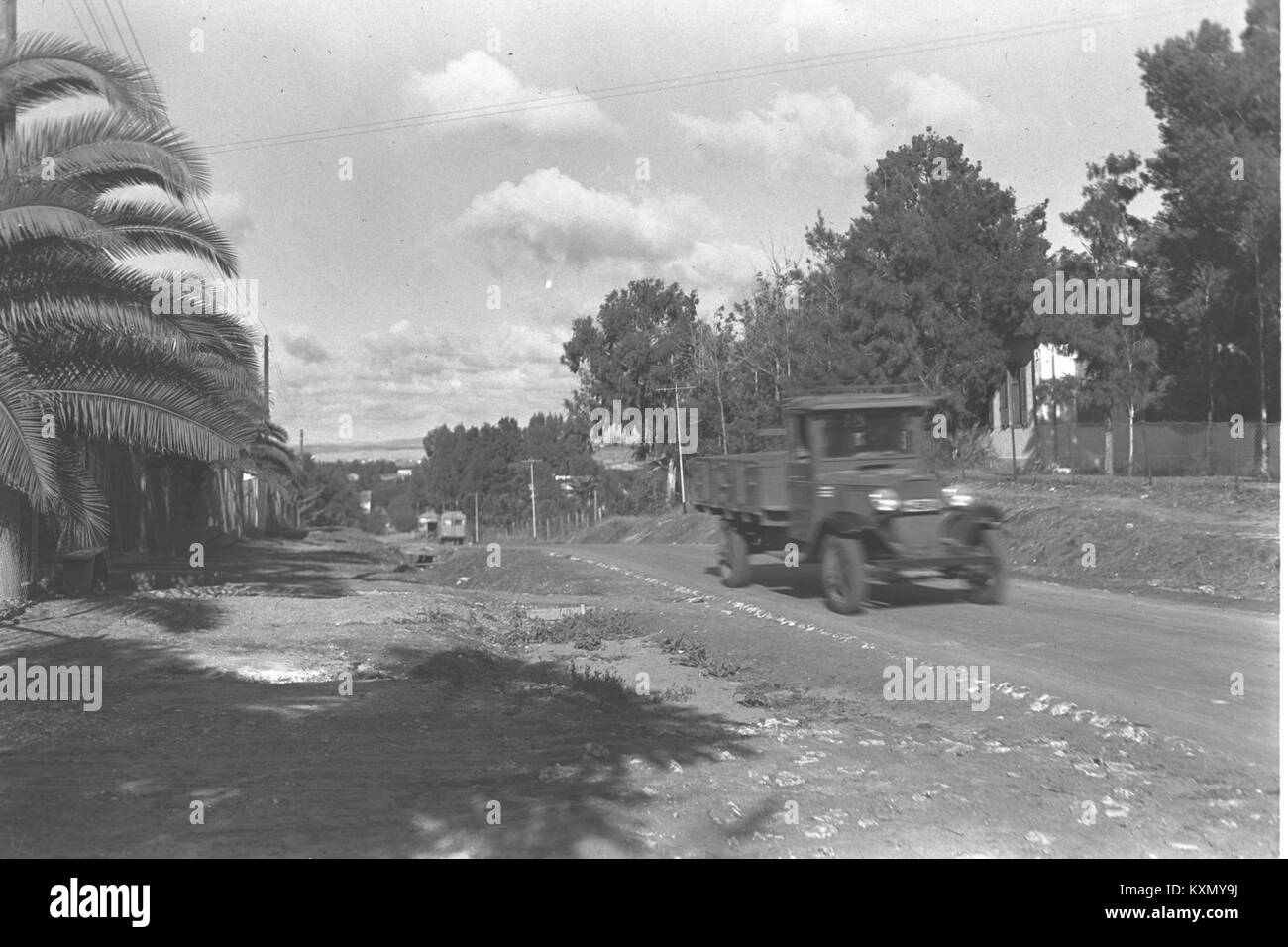 This image depicts a street scene in Hadera, Israel, a city located ...