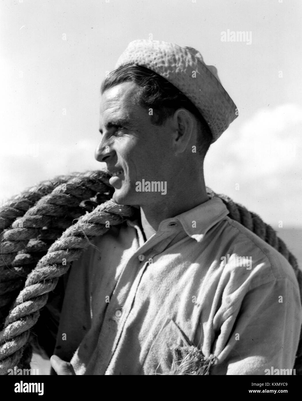 A photograph of a stevedore working at the Tel Aviv Port in Israel ...