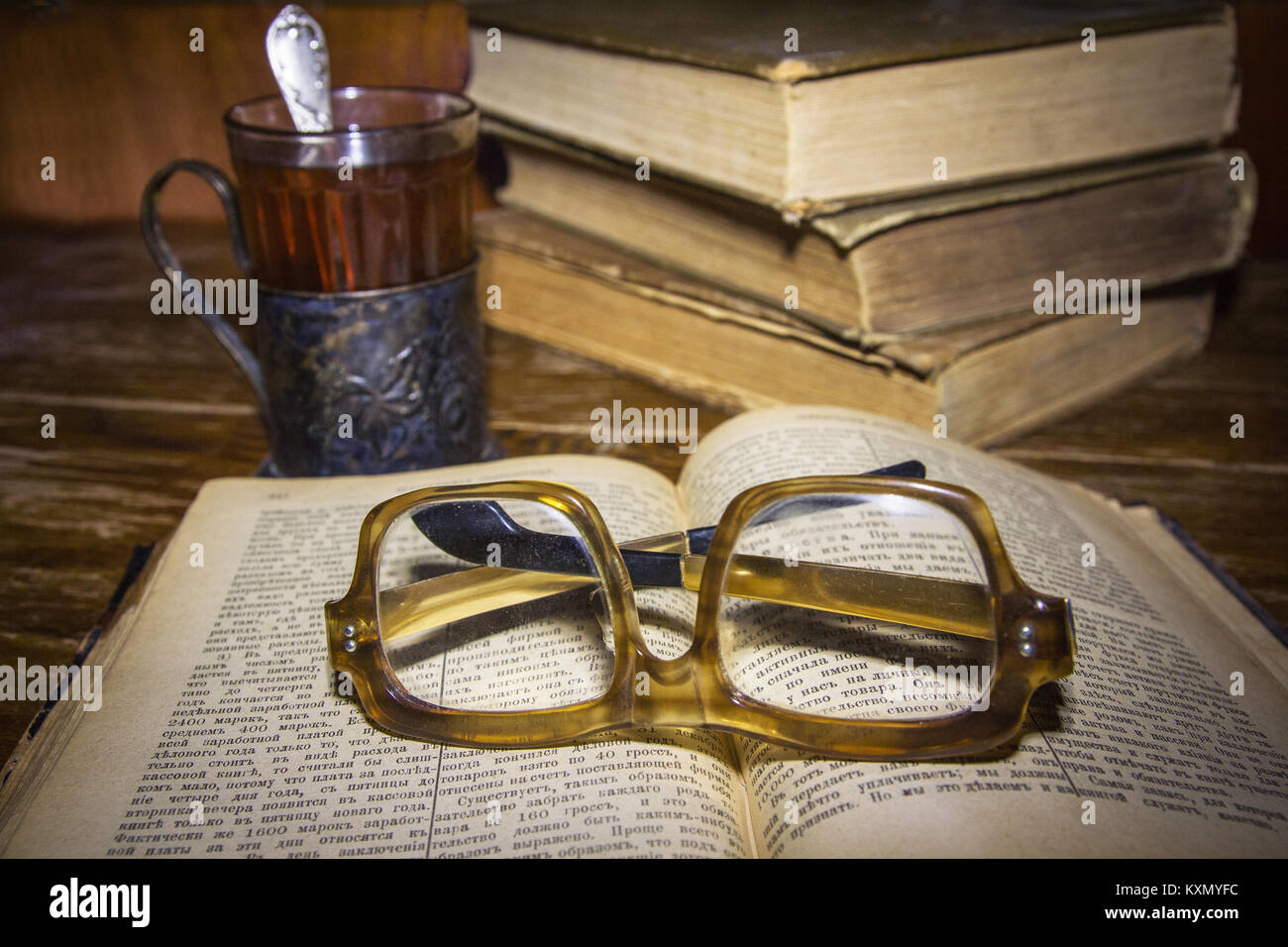 Old books on a woodentable Stock Photo - Alamy