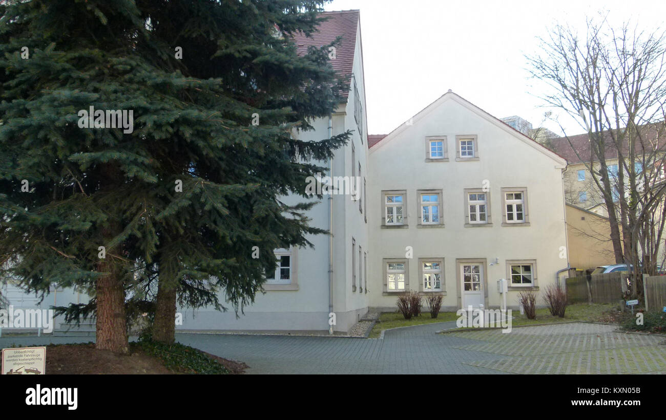This photograph captures August-Bebel-Straße 40-40a in Strehlen, Germany, depicting a ...