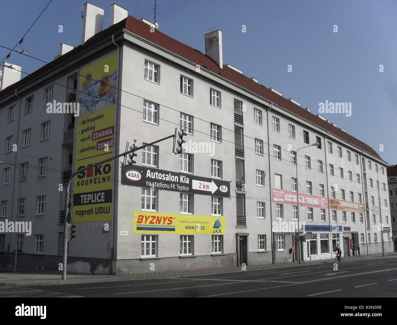 This image captures a block of panel buildings next to the Czech Police ...