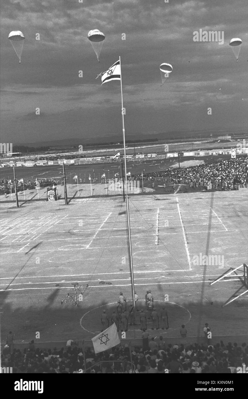 This image shows a parachuting exhibition during the closing ceremony ...