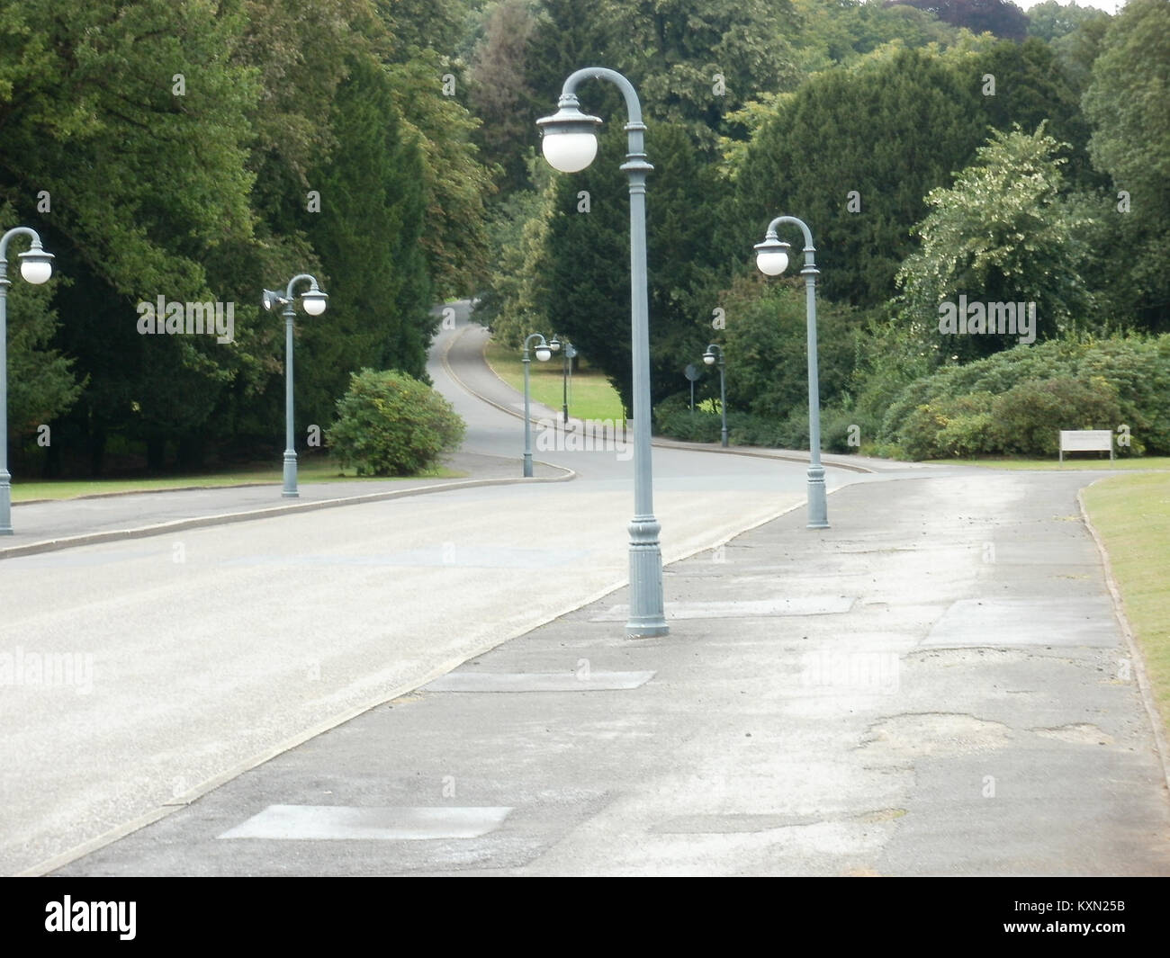 A photograph of Villa Högel in Essen, Germany, showing the park and ...