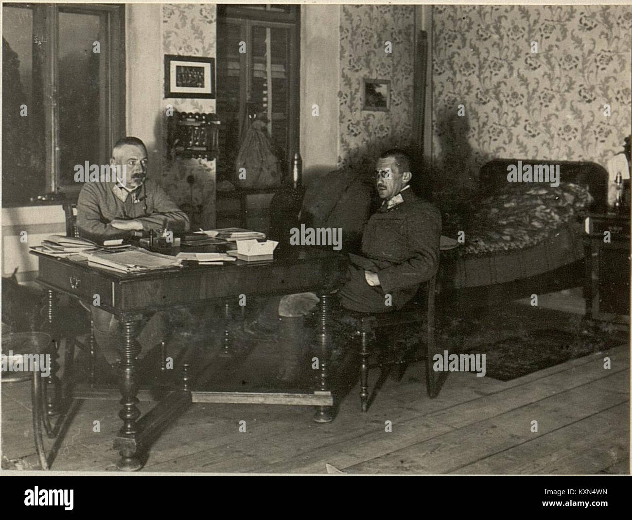 This image shows a meeting with the medical chief of the 48th Infantry ...