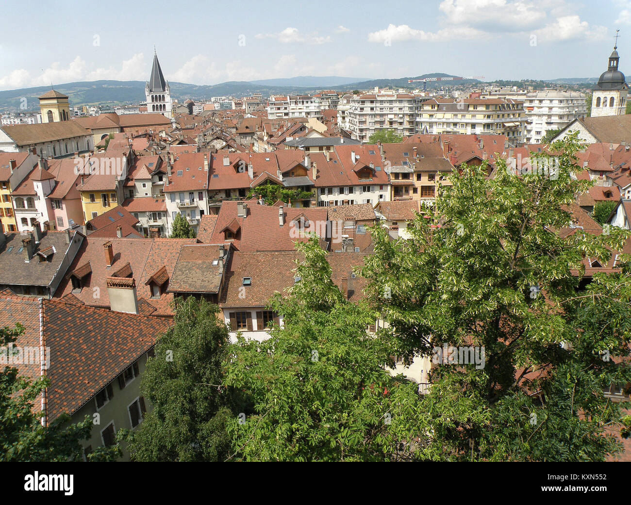 This photograph captures a panoramic view of Annecy, France, showcasing ...