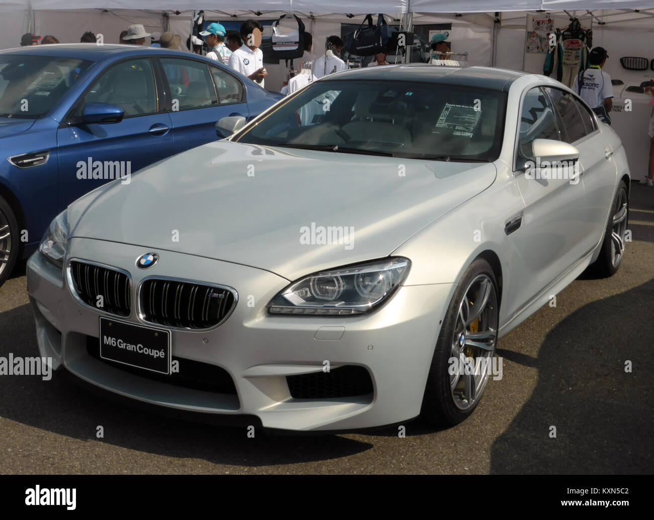 The BMW M6 Gran Coupé (F06) features a sleek, aerodynamic front design ...