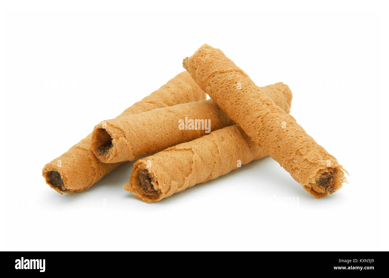chocolate filled wafer rolls studio isolated Stock Photo - Alamy