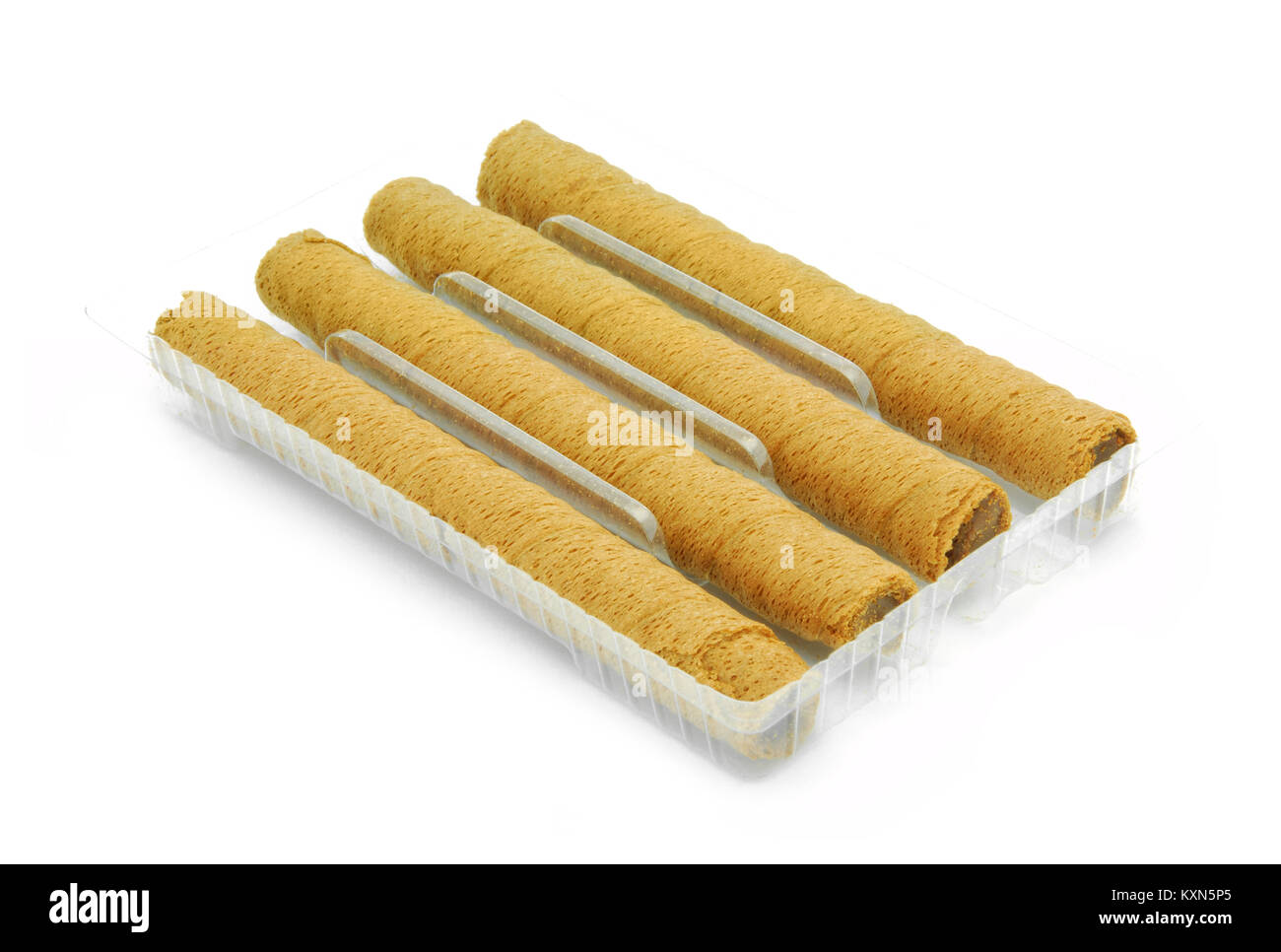 chocolate filled wafer rolls studio isolated Stock Photo - Alamy