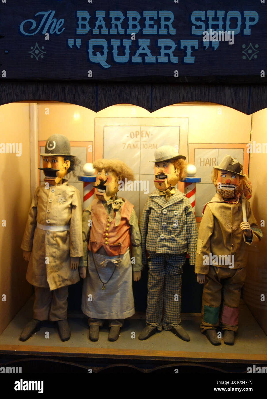 Photograph of the 'Quart' barber shop exhibit at the Musée Mécanique in ...