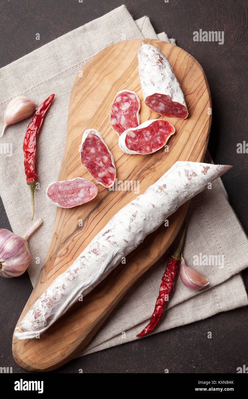 Sliced salami on cutting board. Top view Stock Photo - Alamy