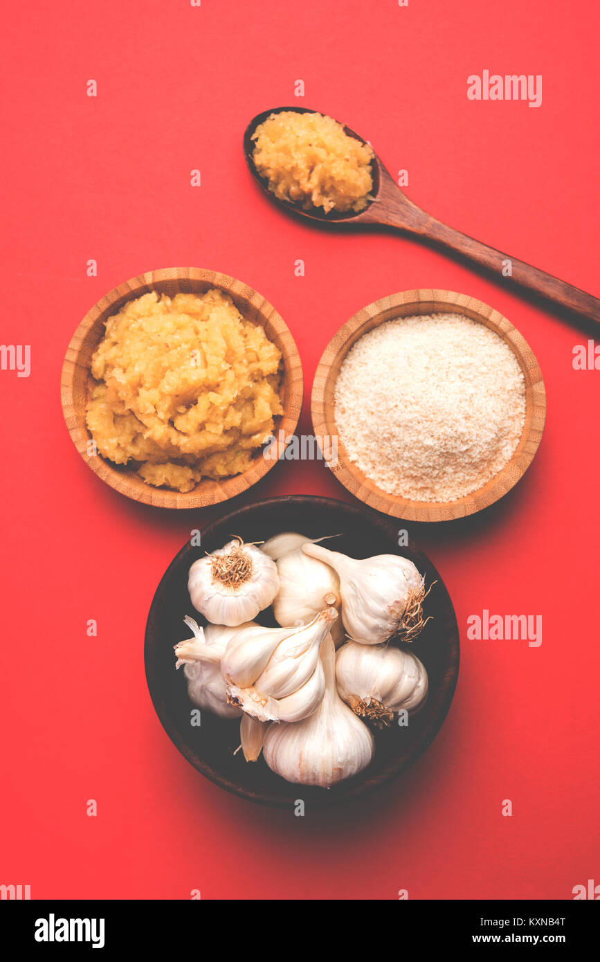 dried granulated garlic powder and garlic paste, selective focus Stock ...