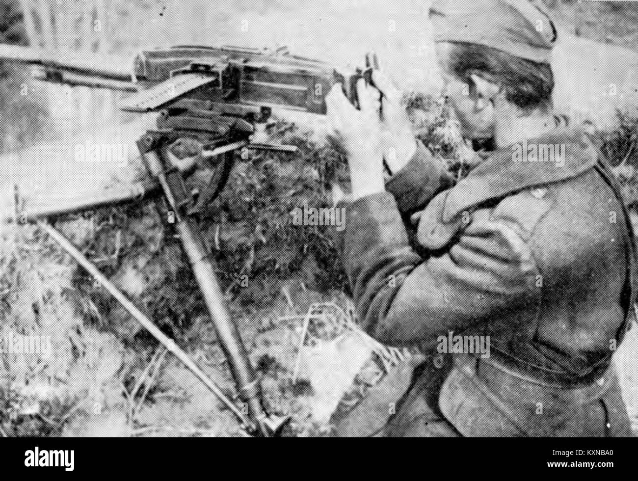 Borec Gradnikove brigade z italijanskim težkim mitraljezom Bredo Stock ...