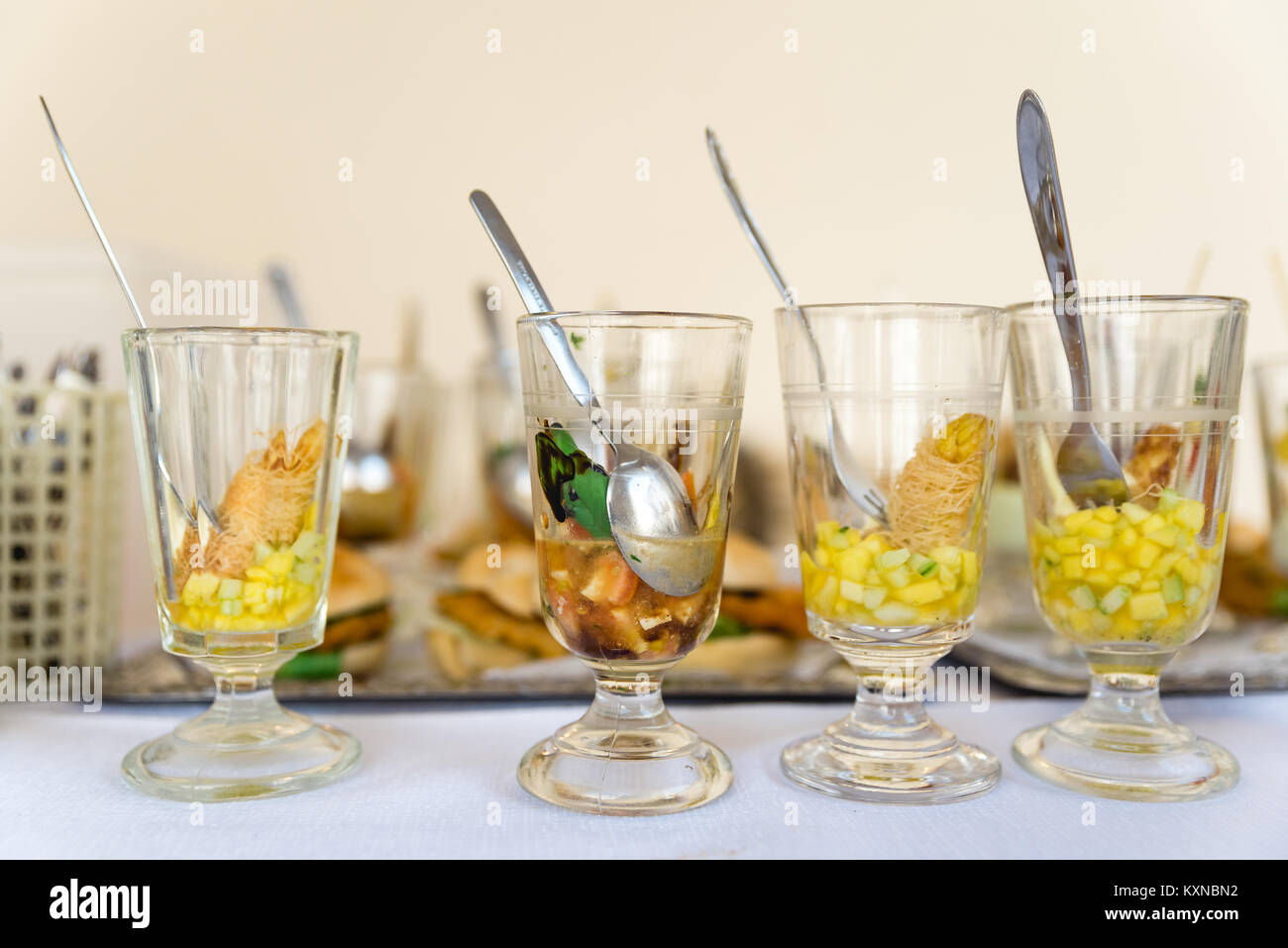 Various party snacks in glasses on a buffet Stock Photo - Alamy