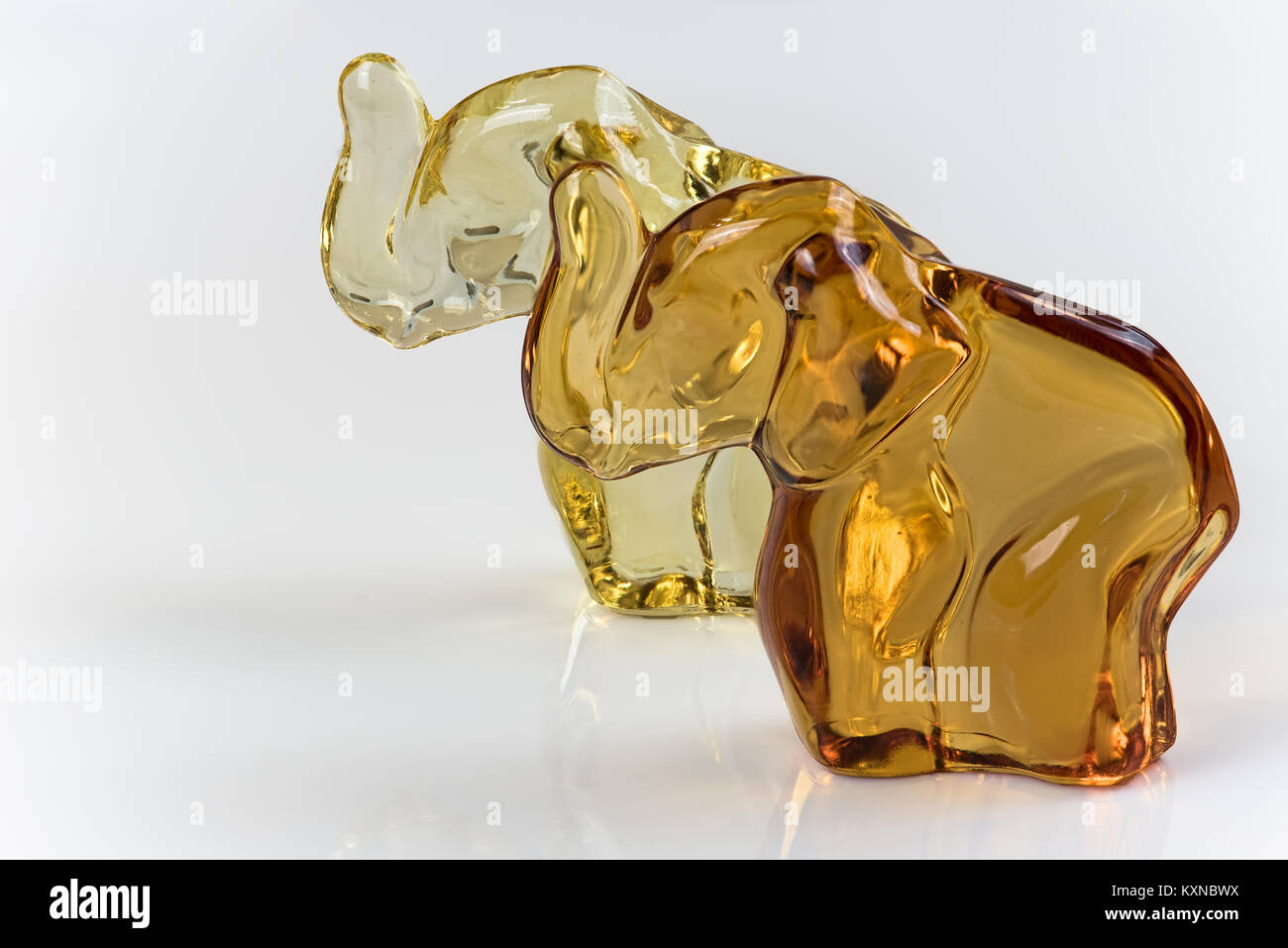 Cute glass elephant figurines isolated on white background Stock Photo ...