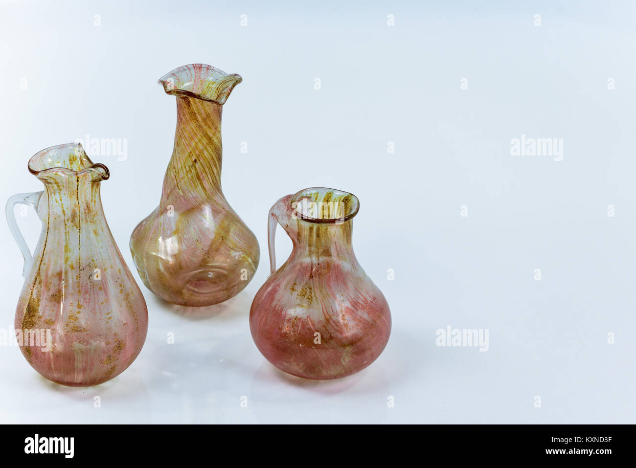 Three small tear bottle raplicas isolated on white background Stock ...