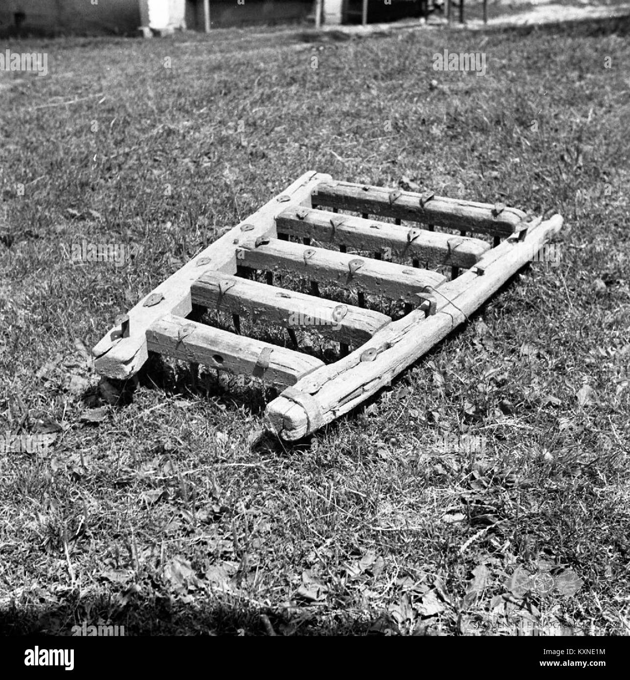 A photograph of a traditional Slovenian wooden rake (brana) with 30 ...