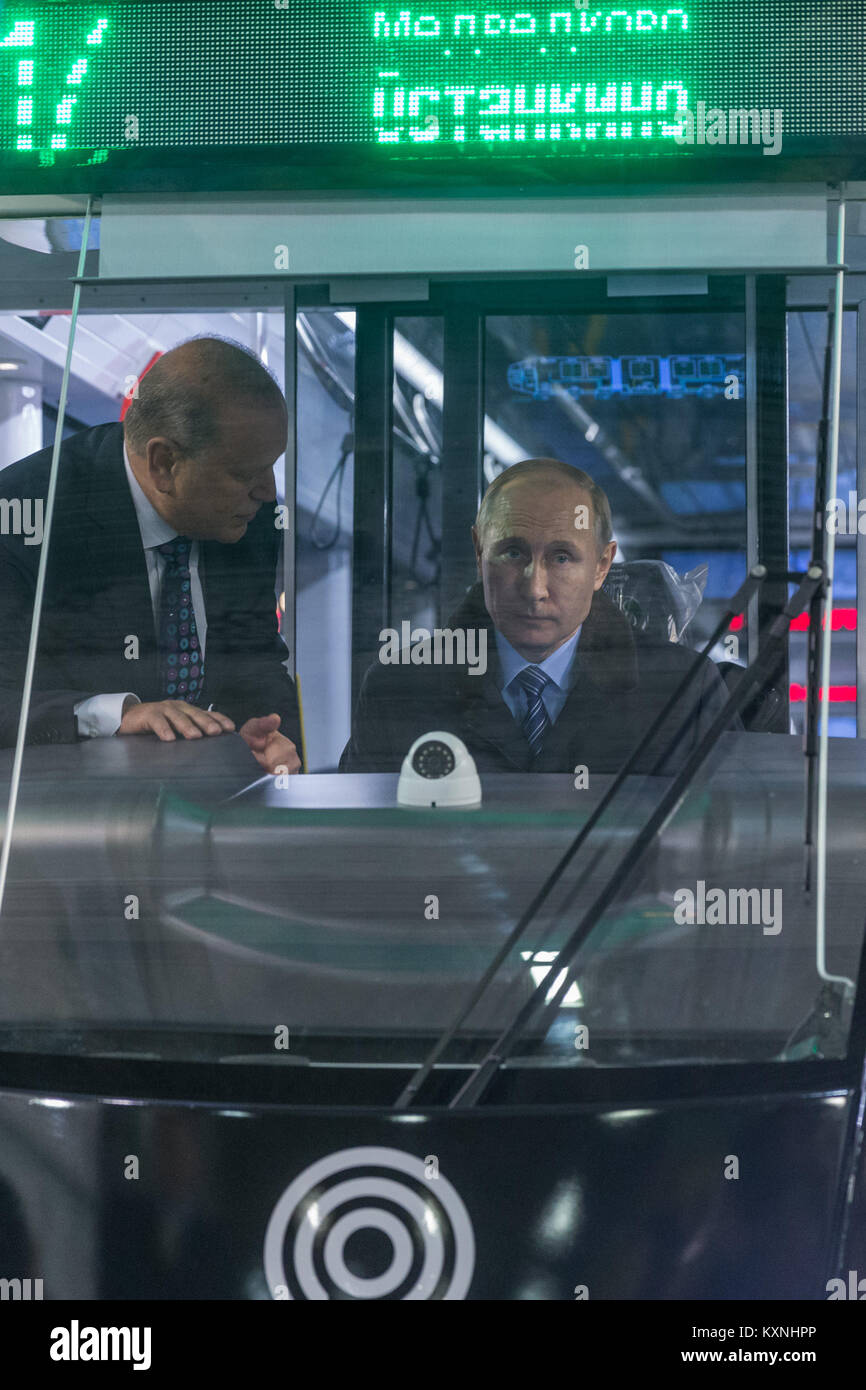 Tver, Russia. 10th Jan, 2018. Russian President Vladimir Putin (R) inspects the cabin of a tram ...