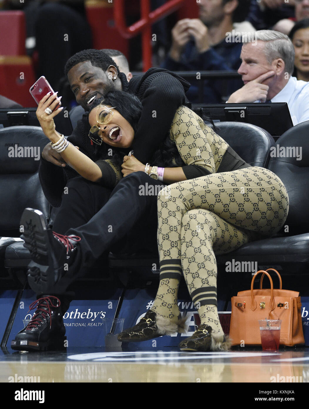 OFF EMBARGO***** MIAMI, FL - JANUARY 5: Gucci Mane (L) and his wife ...
