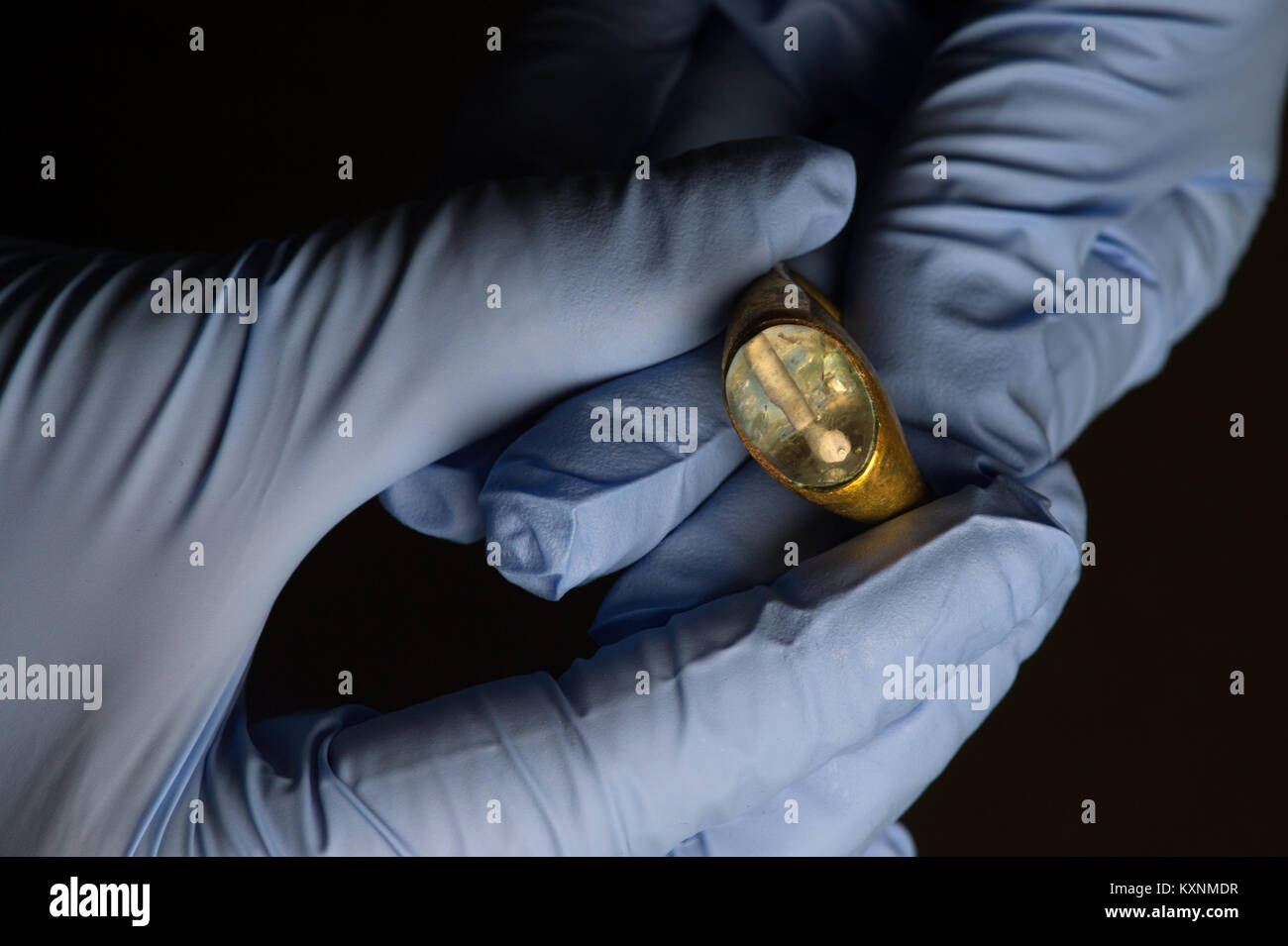 A conservator-restorer from the laboratory for archaeological ...