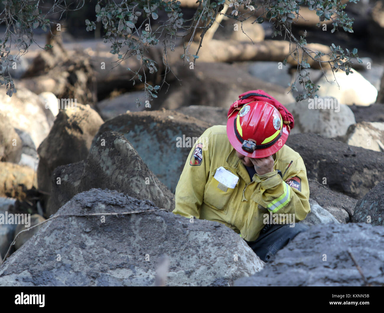 Montecito, California, USA. 10th Jan, 2018. A Cal Fire Firefighter ...