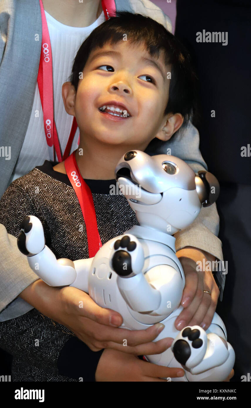 Tokyo, Japan. 11th Jan, 2018. A boy one of the new owners of Sony's ...