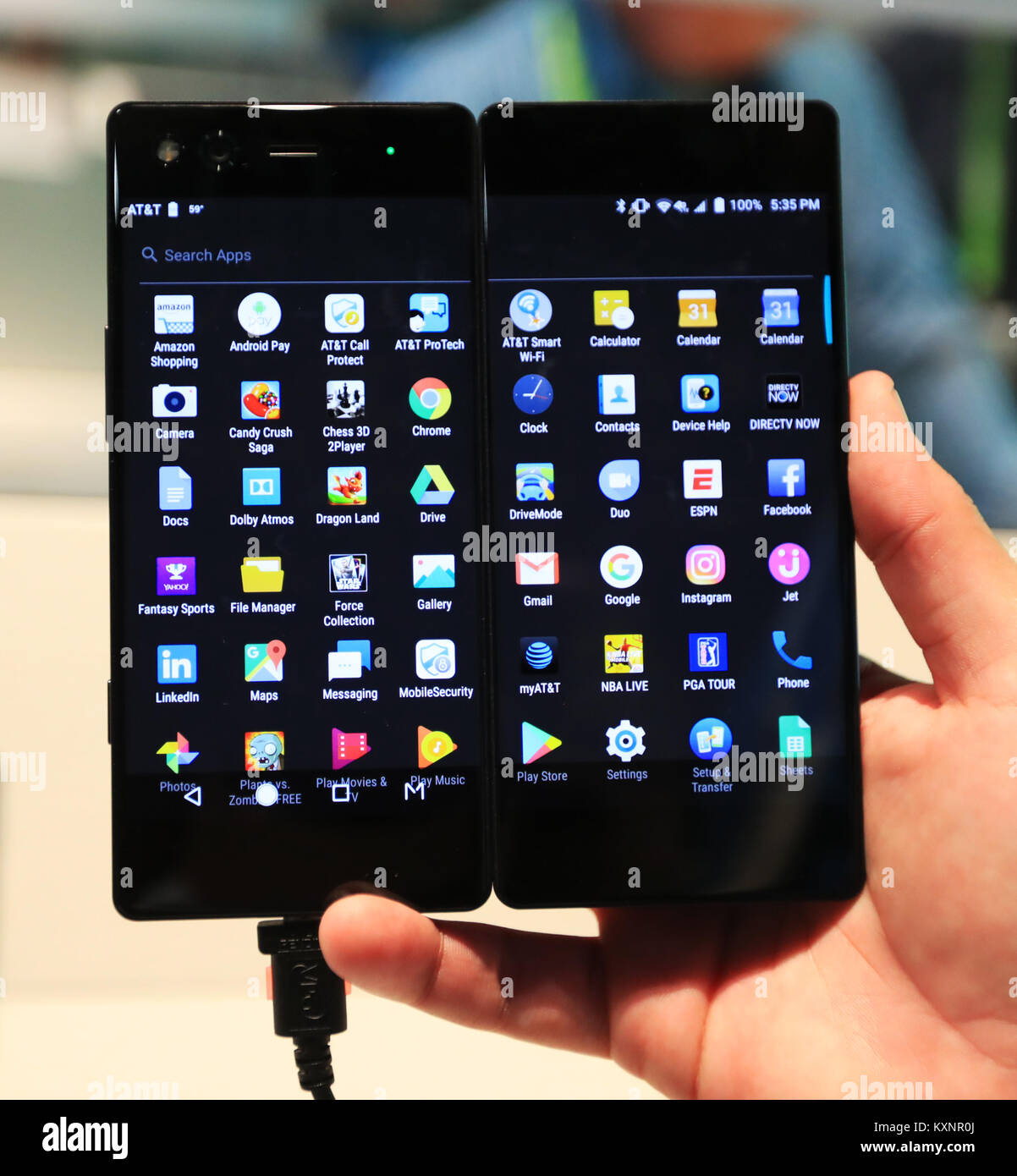 Las Vegas, USA. 10th Jan, 2018. A staff member shows a dual-screen ...