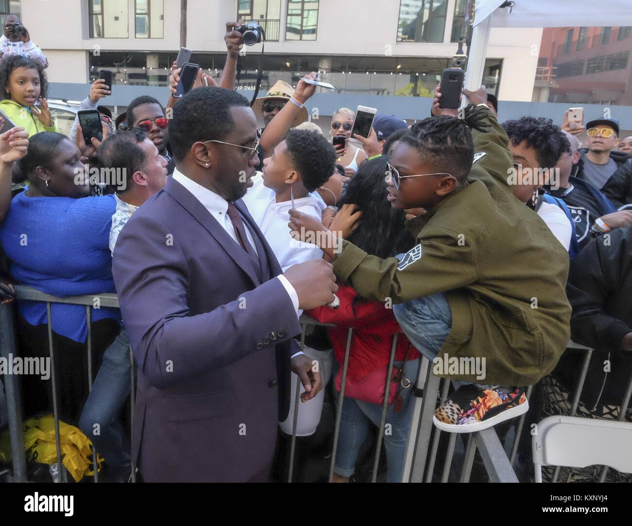 Los Angeles, California, USA. 11th Jan, 2018. Sean 'Diddy' Combs signs ...