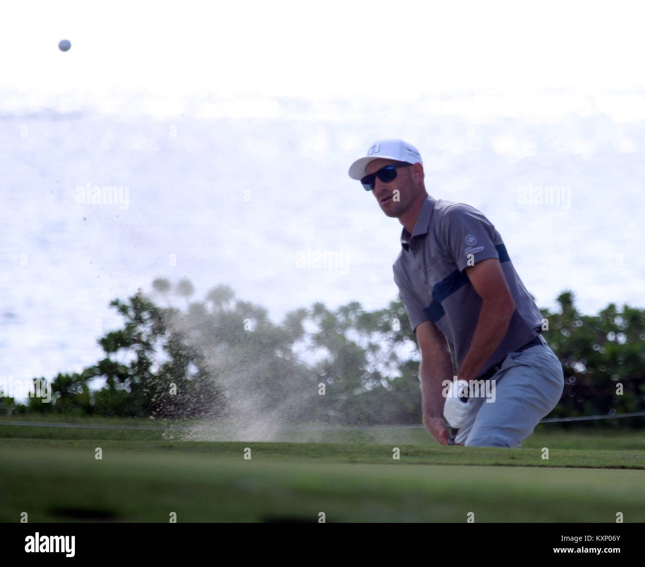 Honolulu, Hawaii, USA. January 11, 2018 - Eric Dugas hits out of the ...