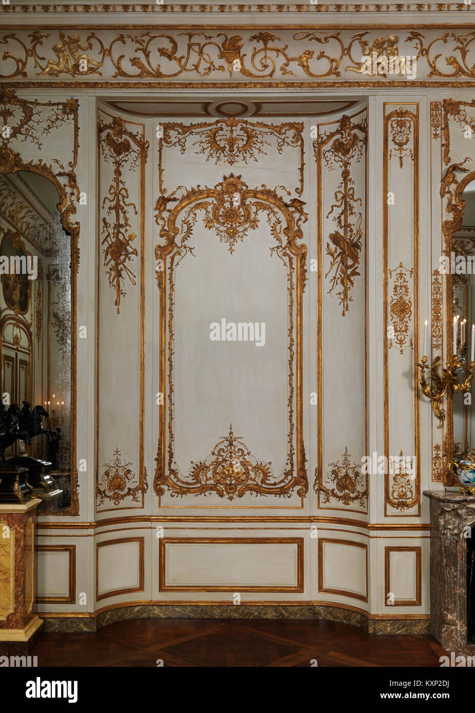 A boiserie, or wood paneling, from the Hôtel de Varengeville, is a ...