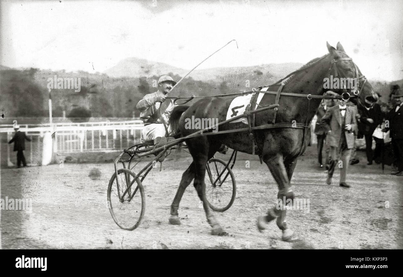 A photograph captures a trotting and horse race at Lasarte racetrack ...