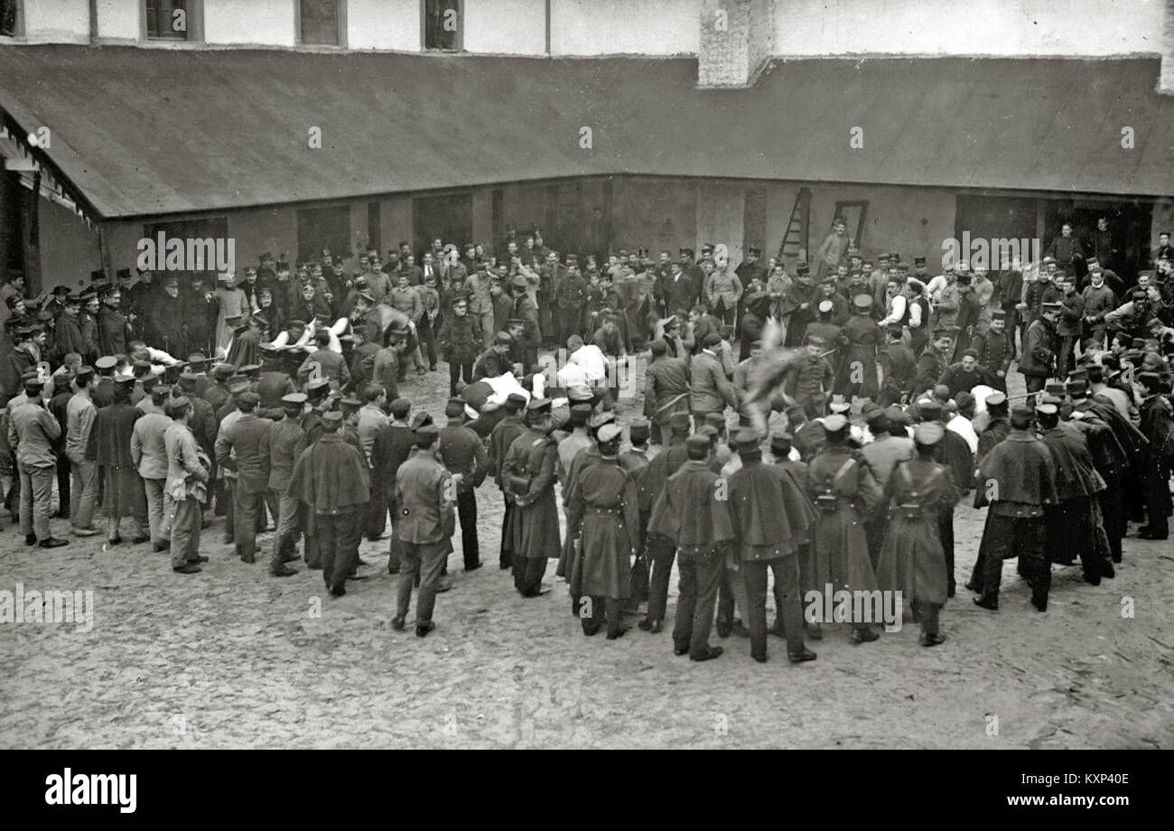 A celebration in the courtyard of a military barracks depicting social ...
