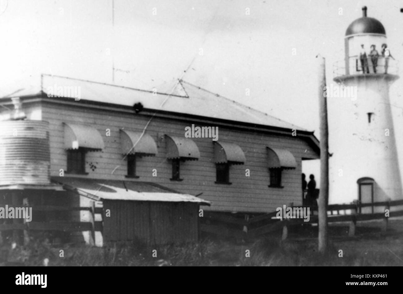A historical photograph of Caloundra Lighthouse and the keeper's ...