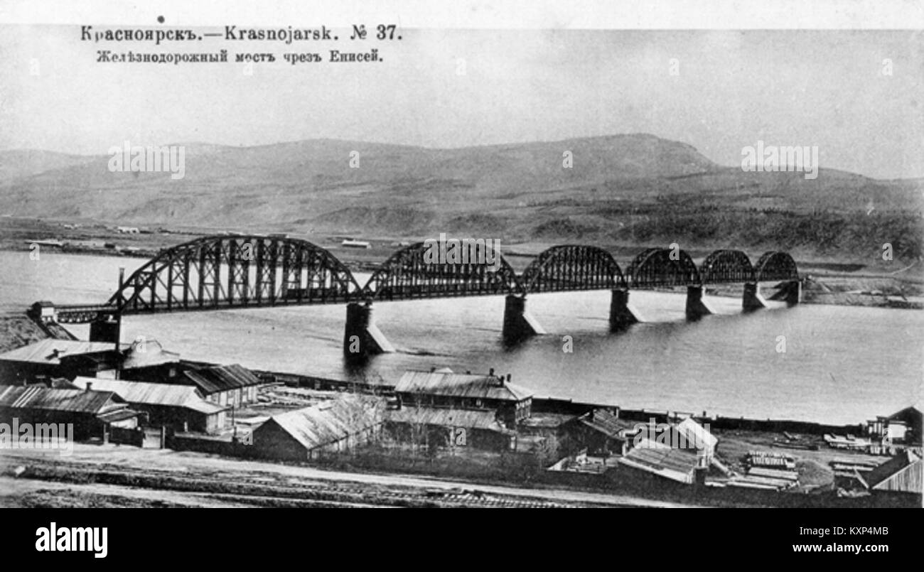 A photograph depicting a bridge over the Yenisei River, showcasing its ...