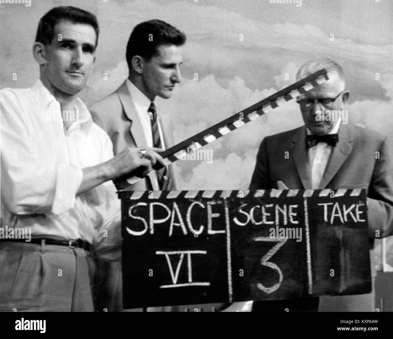 A clapperboard, a device used in film production to mark scenes and ...
