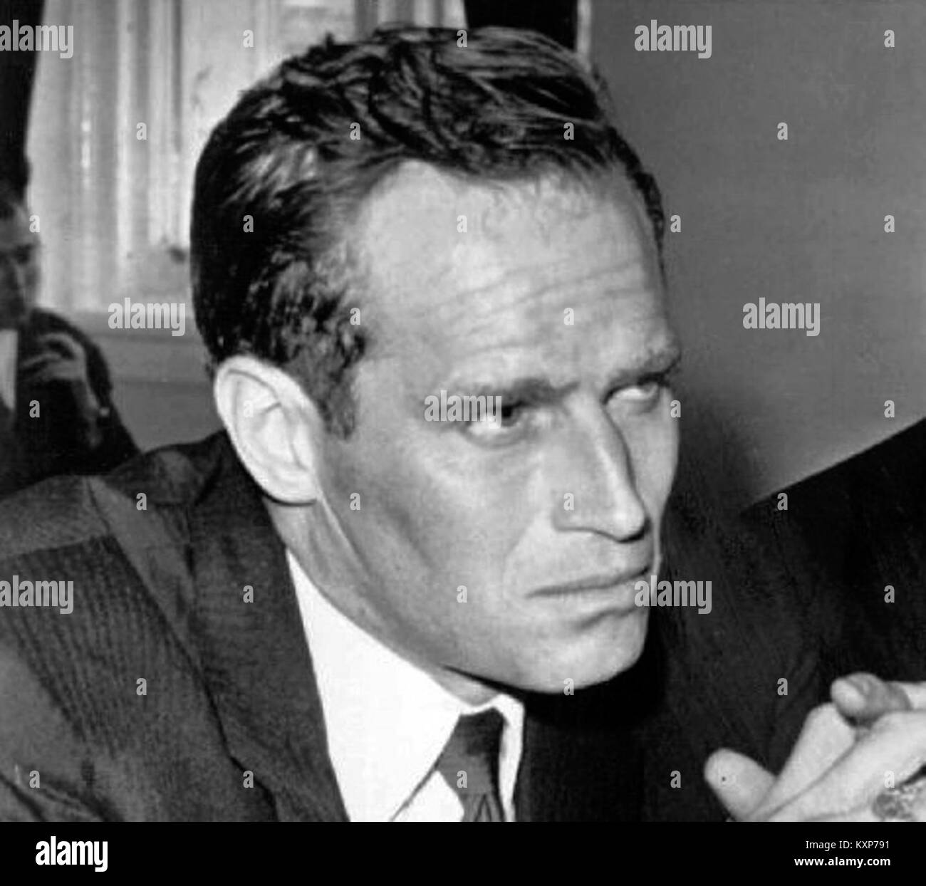 A cropped image of Charlton Heston at a 1961 hearing, representing his ...