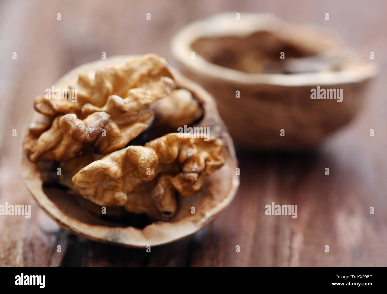 Some walnut closeup in natural surface Stock Photo - Alamy