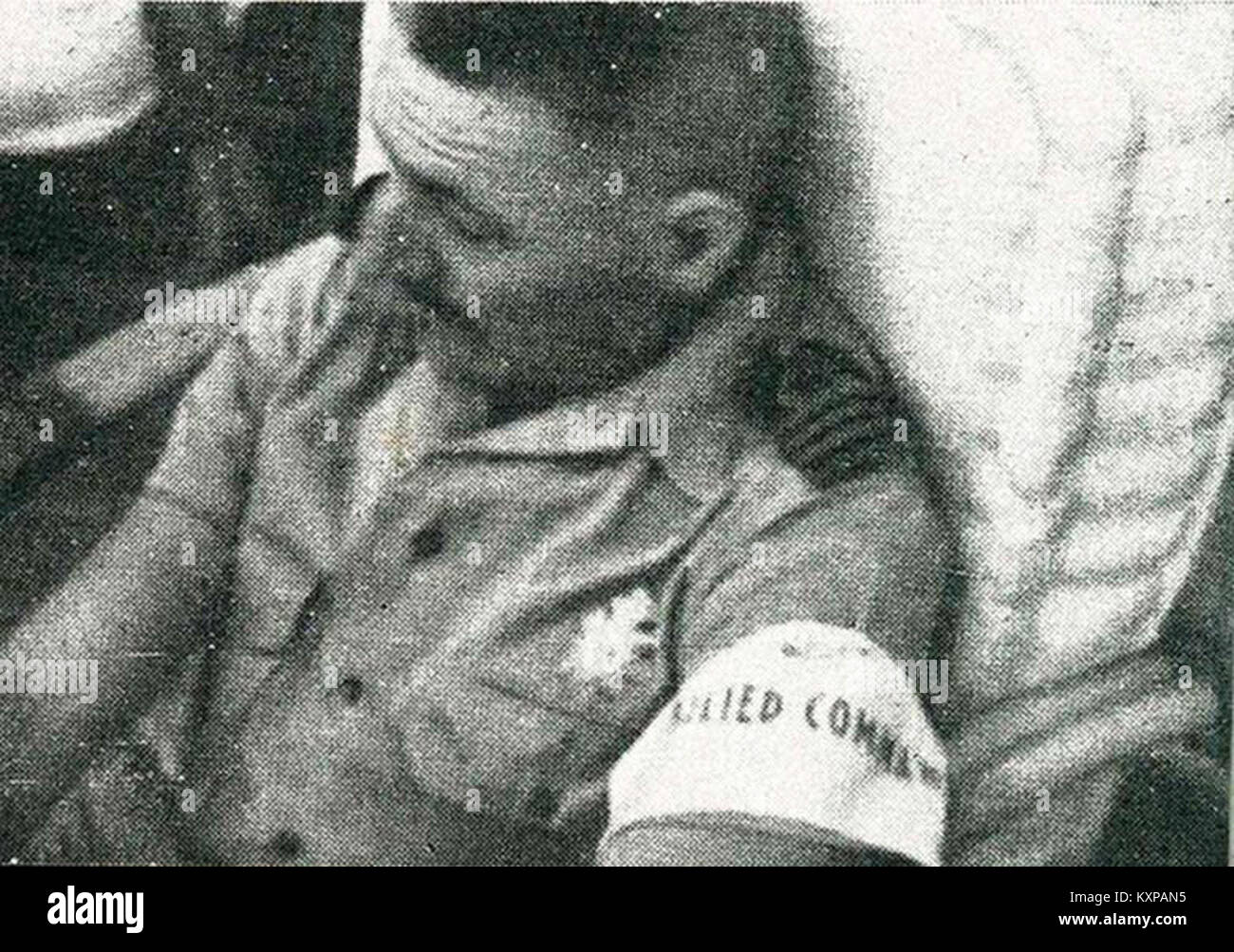 This image portrays a captured Allied officer, offering a visual ...