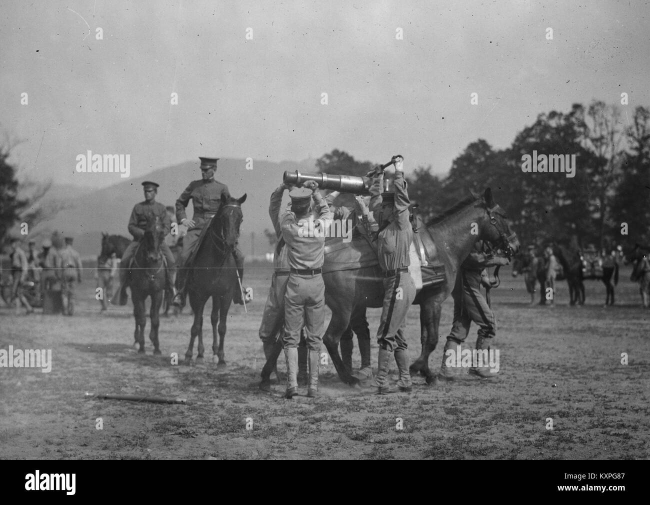 Cowboy Rides Rearing Horse & Waves his Hat Stock Photo - Alamy
