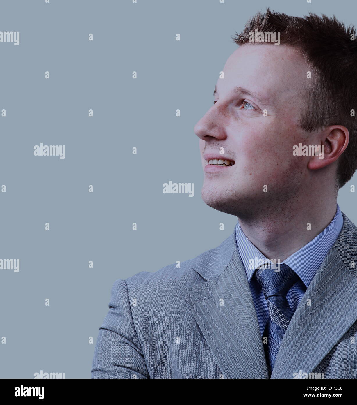 Closeup portrait of pensive handsome smiling man looking up in s Stock ...