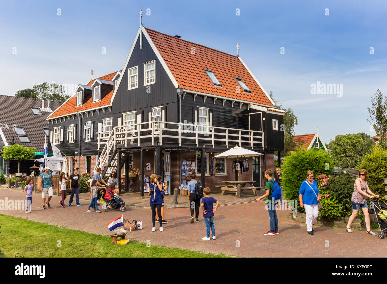 Tourists doing a sightseeing tour in Marken, Holland Stock Photo - Alamy