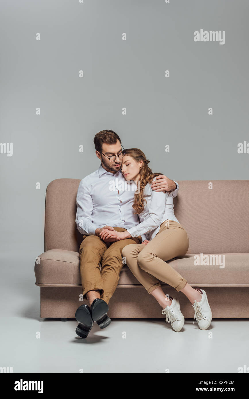 handsome young man hugging beautiful girlfriend sleeping on his ...