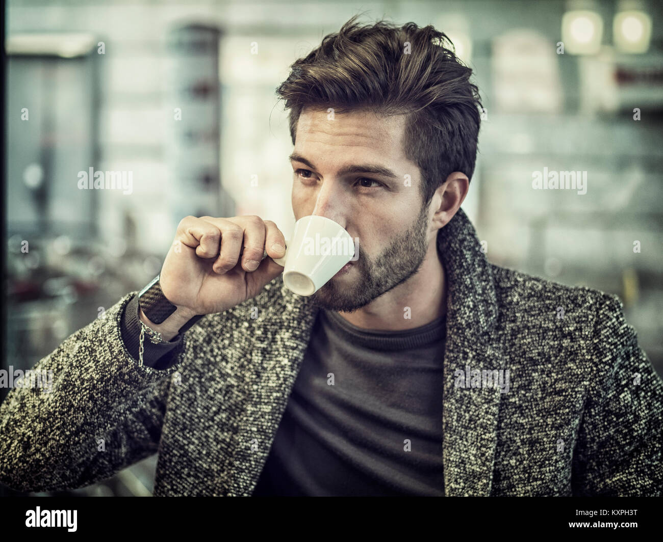 Attractive Man Drinking Coffee Stock Photo - Alamy