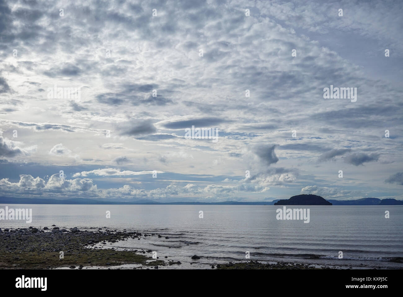 The lake with cloudscape at sunny day in North Island, New Zealand ...