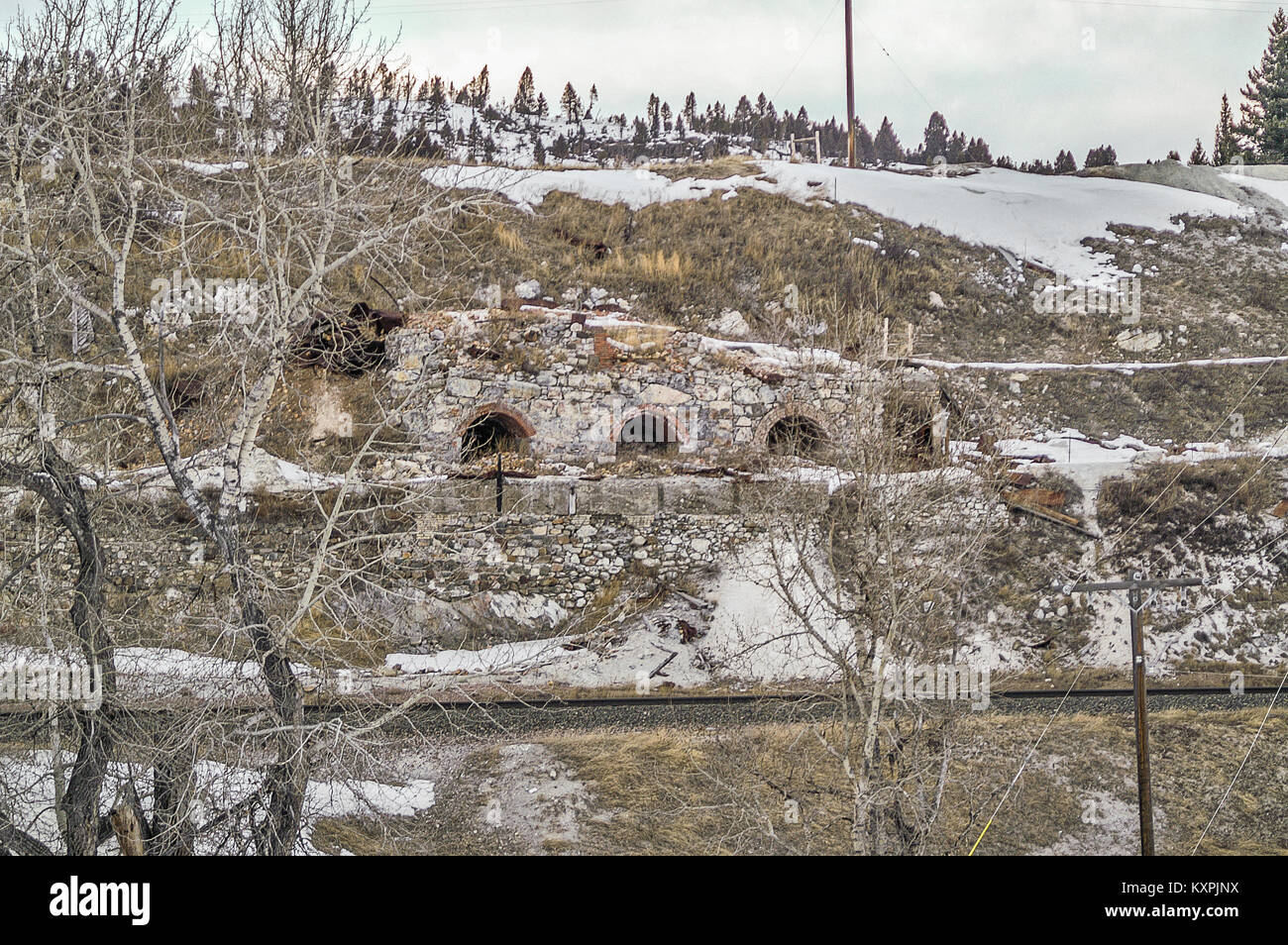 Crumbling tunnels along a railroad track Stock Photo - Alamy