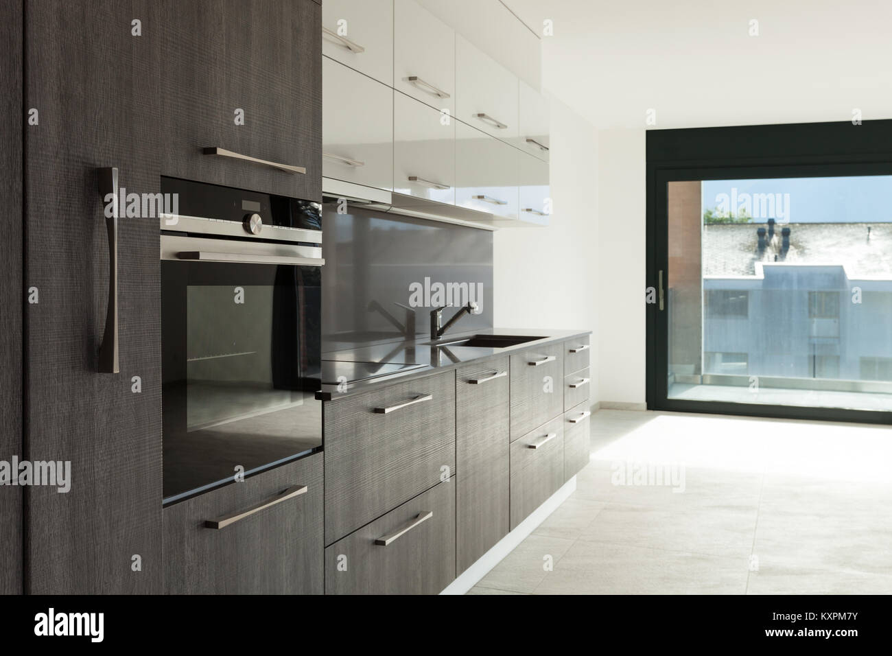 Interior of empty apartment, modern kitchen Stock Photo - Alamy