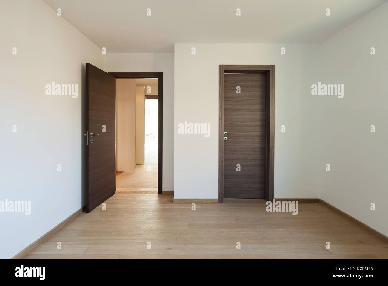 Interior of empty apartment, wide room with wooden floor Stock Photo ...