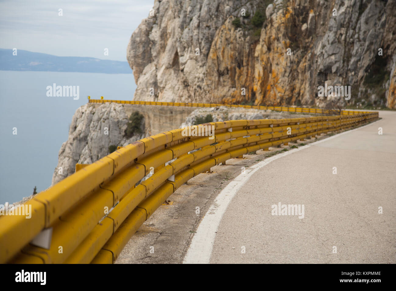 Adriatic highway, European route E65, with its yellow traffic barriers ...