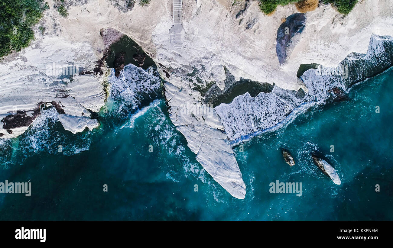 Aerial view of landmark big white chalk rock at Governor's beach ...