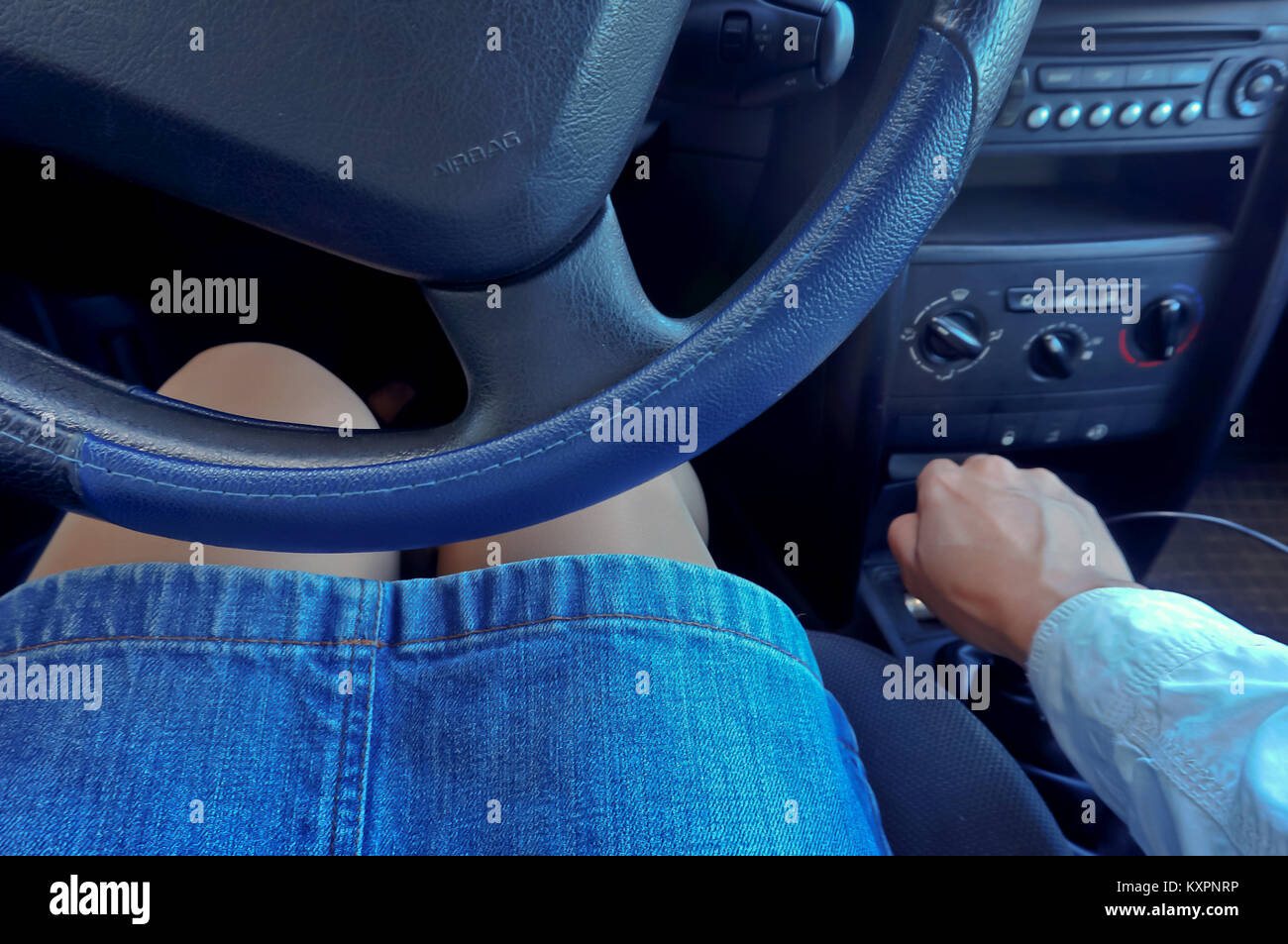 Girl behind steering wheel hi-res stock photography and images - Alamy